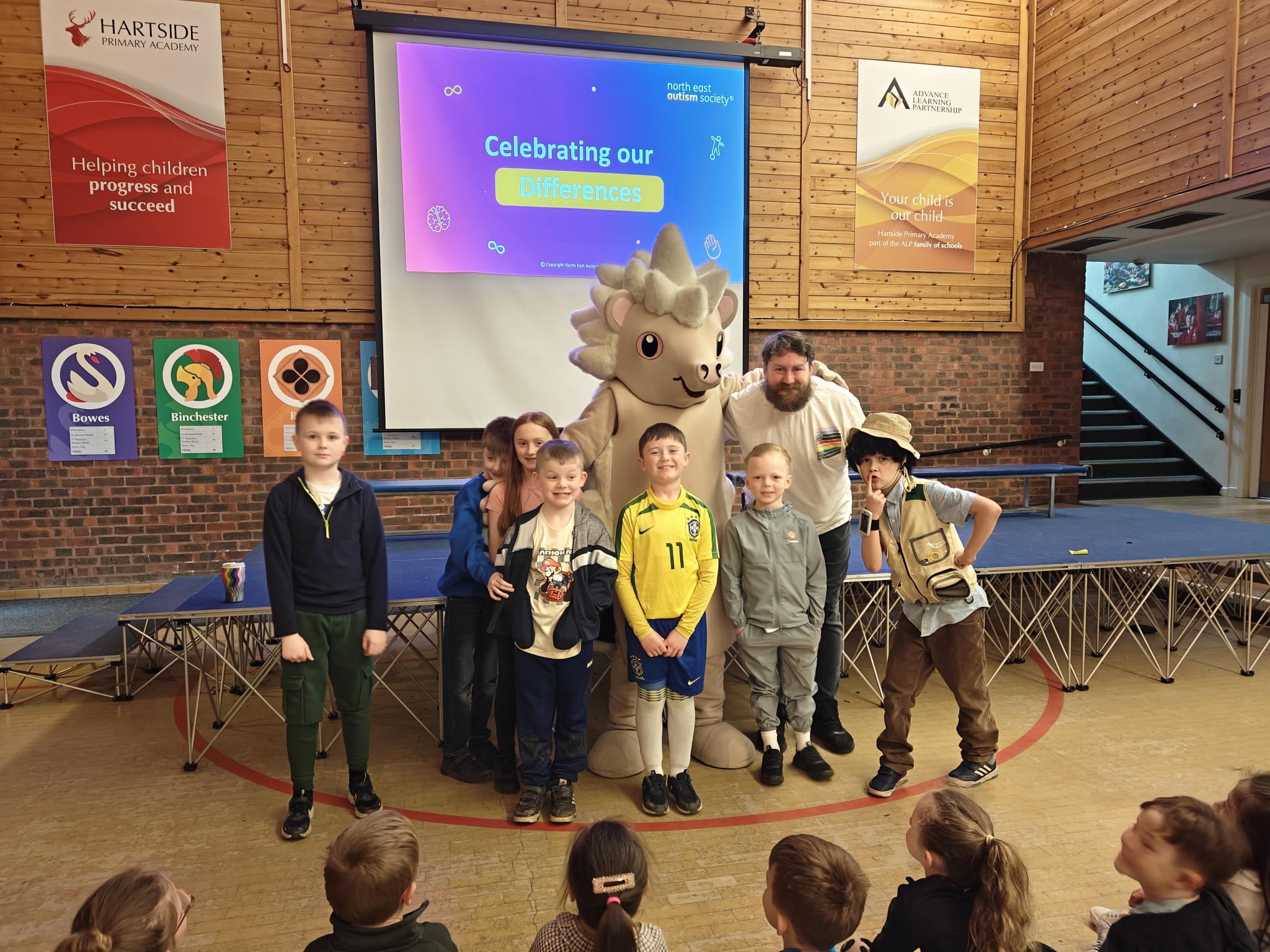 Pupils celebrate differences and meet a giant hedgehog on World Autism ...